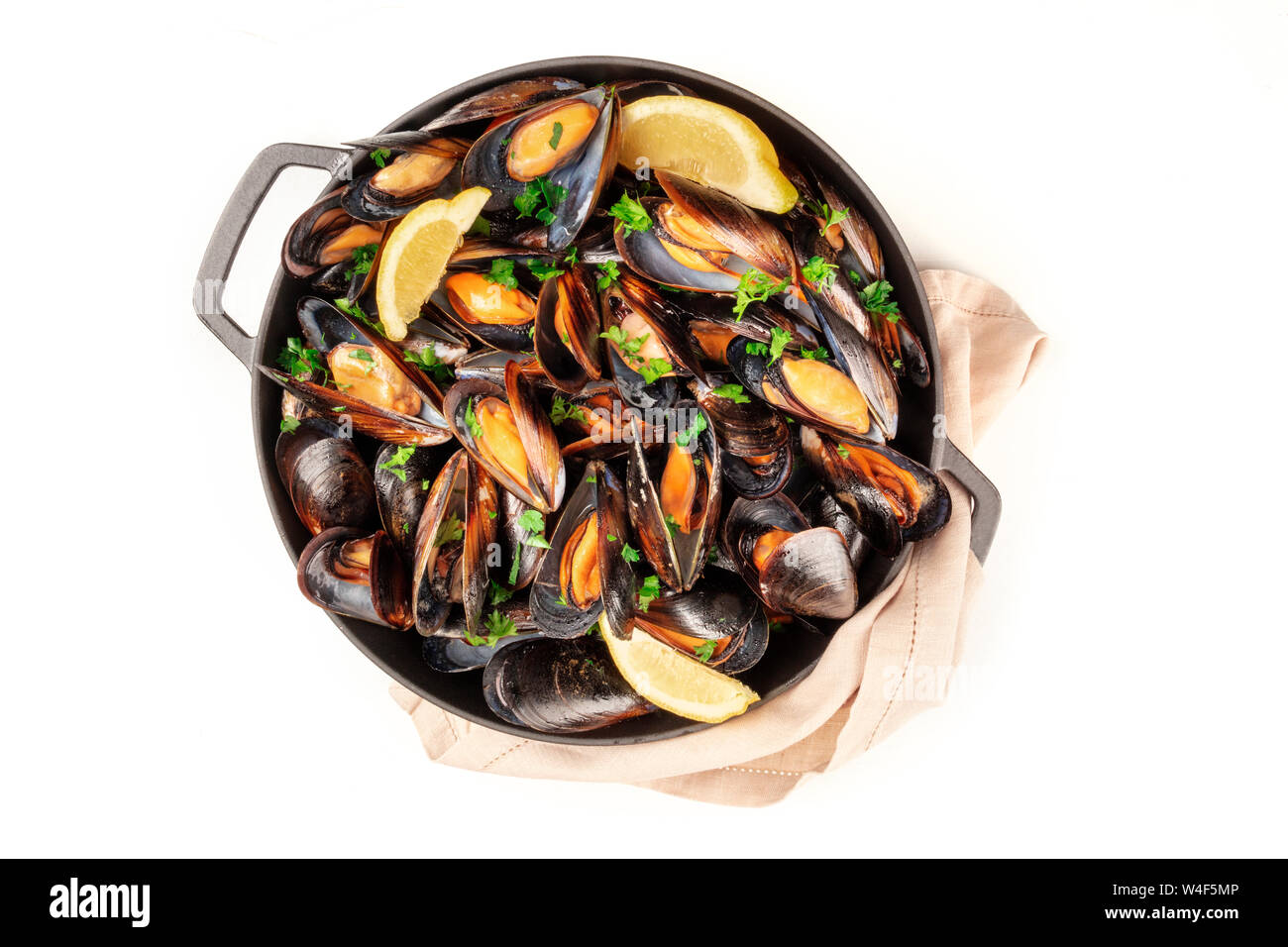 Marinara mussels, moules mariniere, on a white background, shot from ...