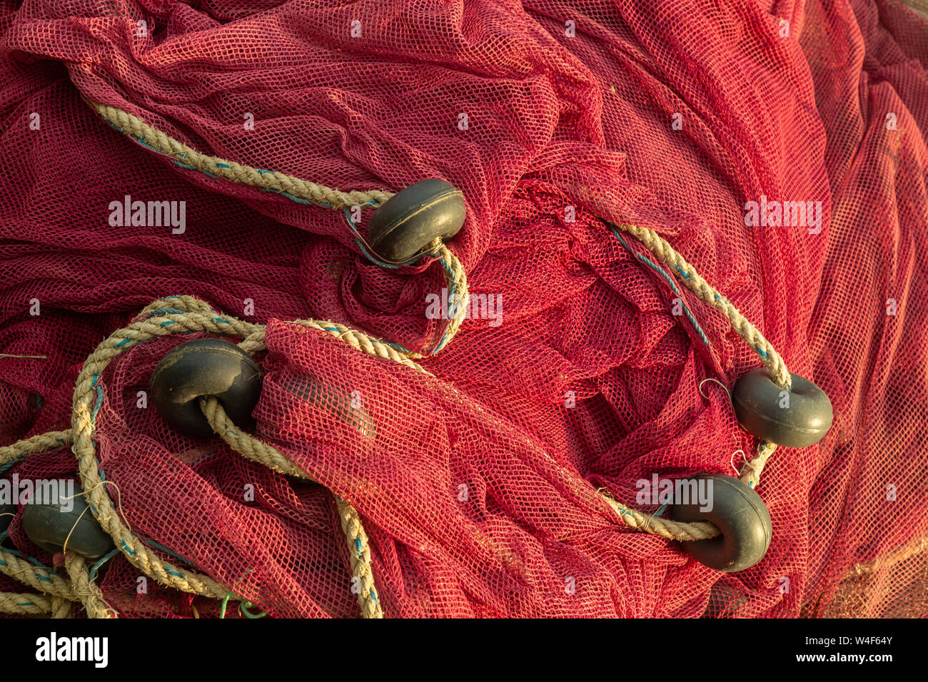 tangle of colored fishing nets Stock Photo - Alamy