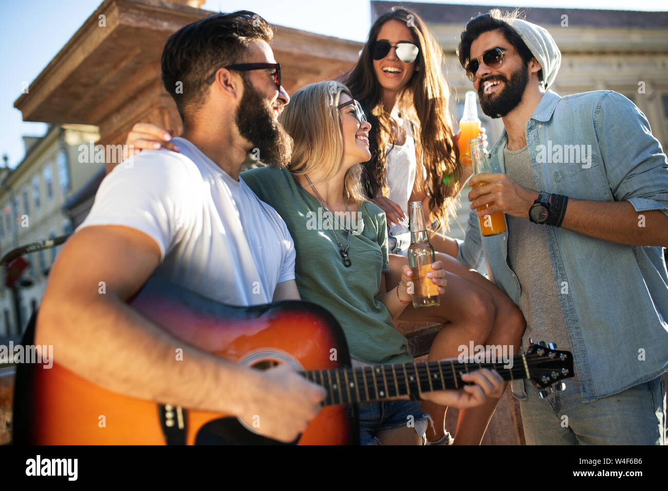 Group of young friends having fun together outdoor Stock Photo - Alamy