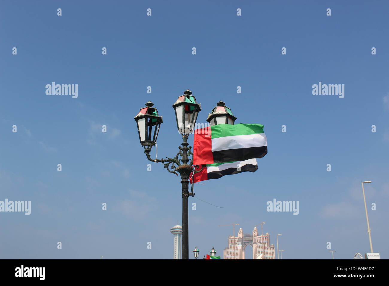 UAE National Flag on Street Lights in Abu Dhabi Stock Photo - Alamy