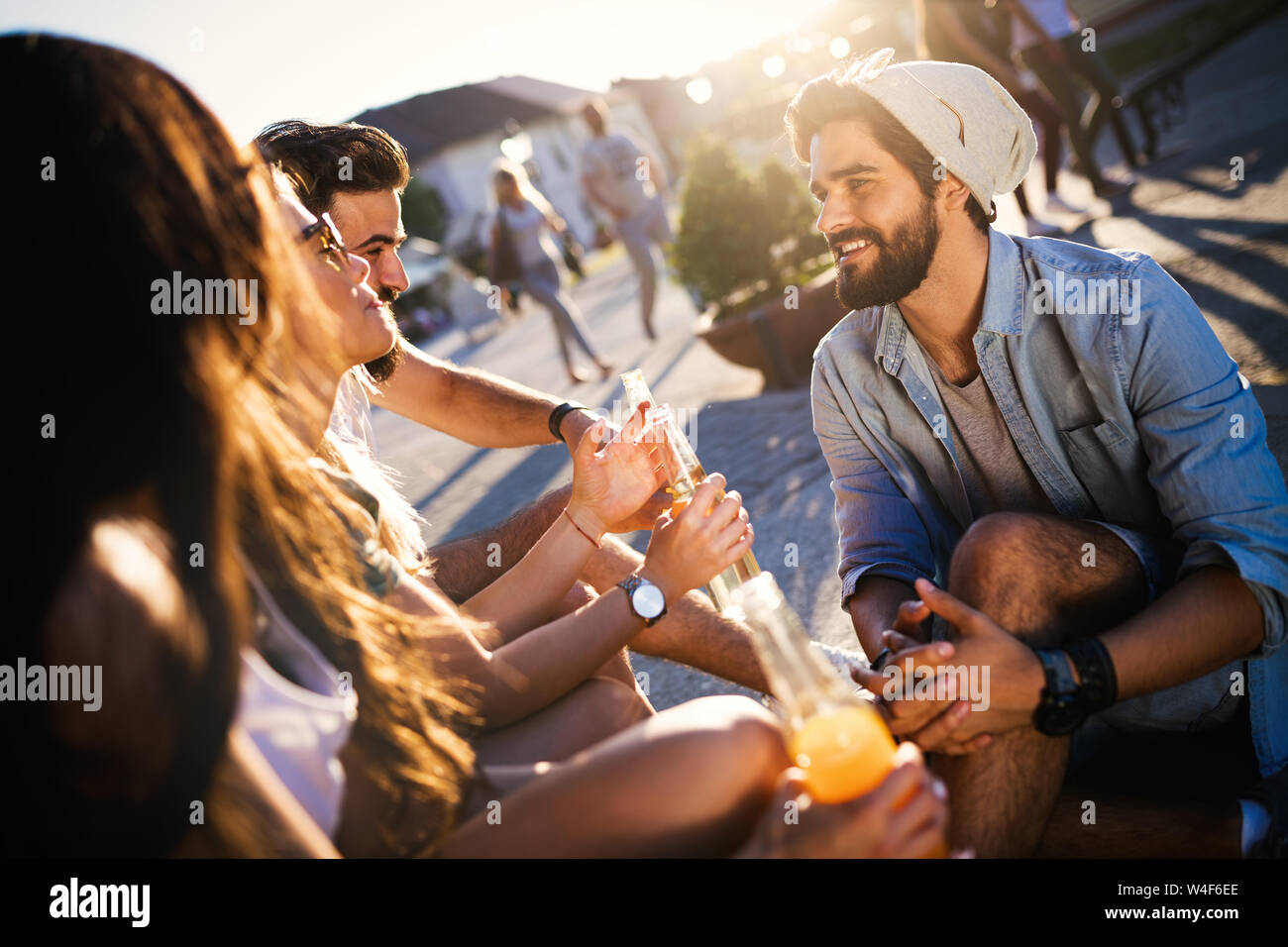 Group of friends hanging out, having fun and enjoying summer days Stock ...