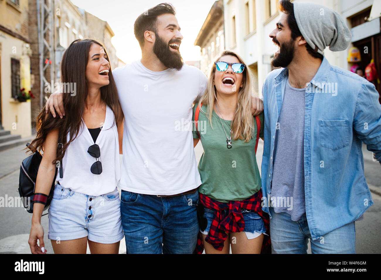 Group of young friends having fun together outdoor Stock Photo - Alamy