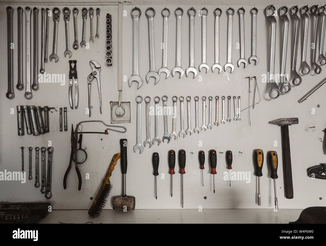 Various tools for car repair, scene from workshop Stock Photo - Alamy