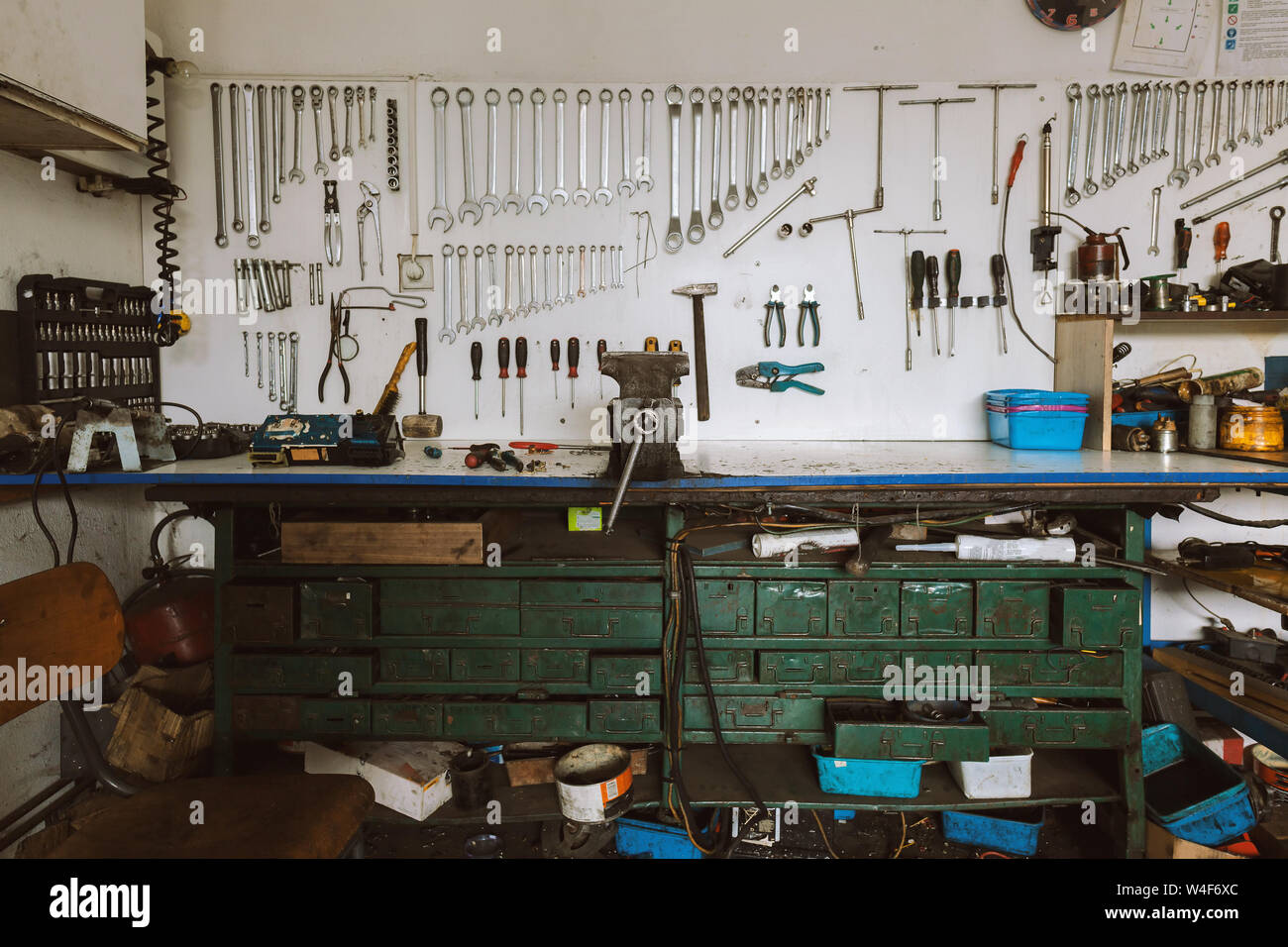 Various tools for car repair, scene from workshop Stock Photo - Alamy