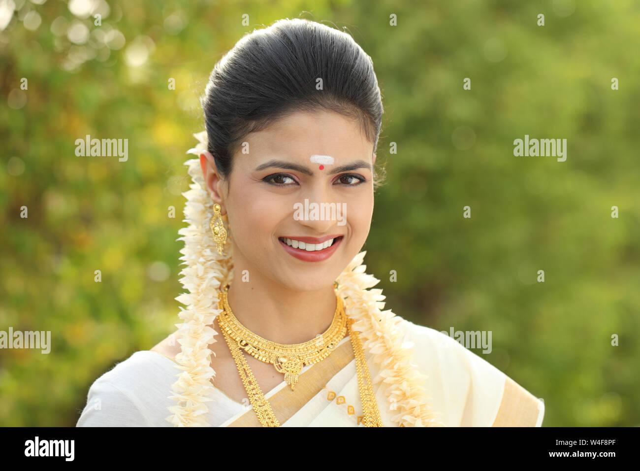 Portrait of a south Indian woman smiling Stock Photo - Alamy