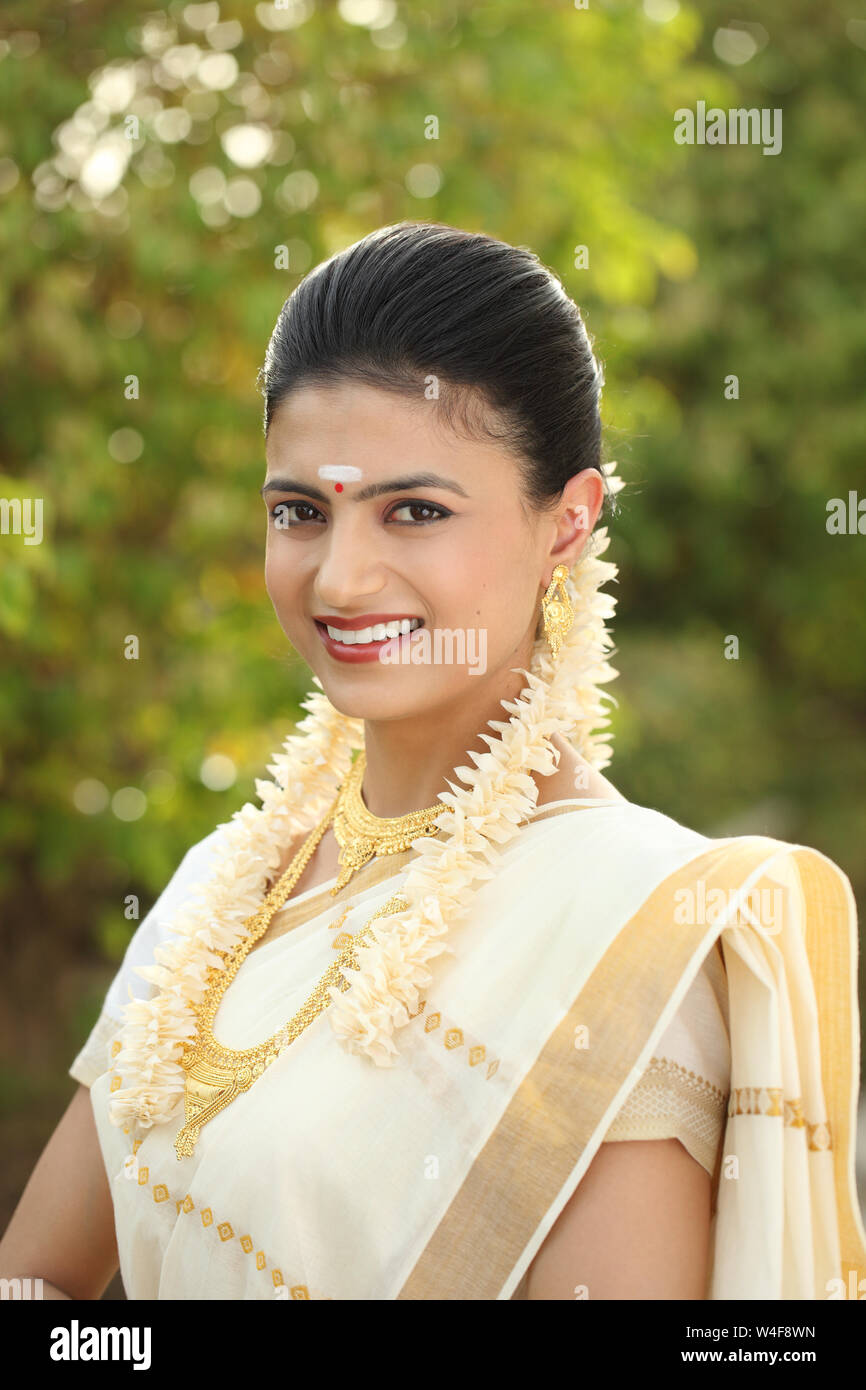 Portrait of a south Indian woman smiling Stock Photo - Alamy