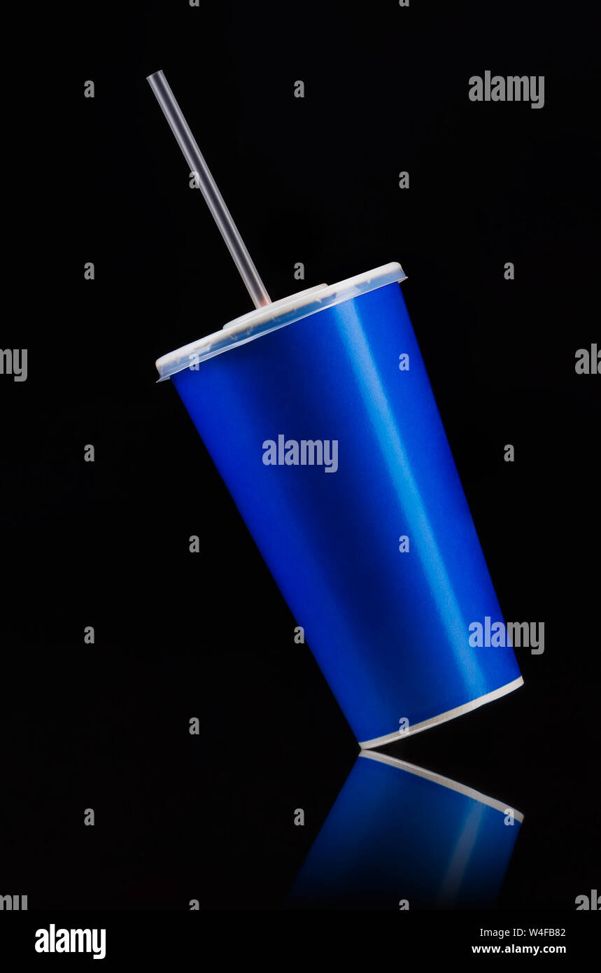 Blue cup with cap and tube isolated on black background Stock Photo - Alamy