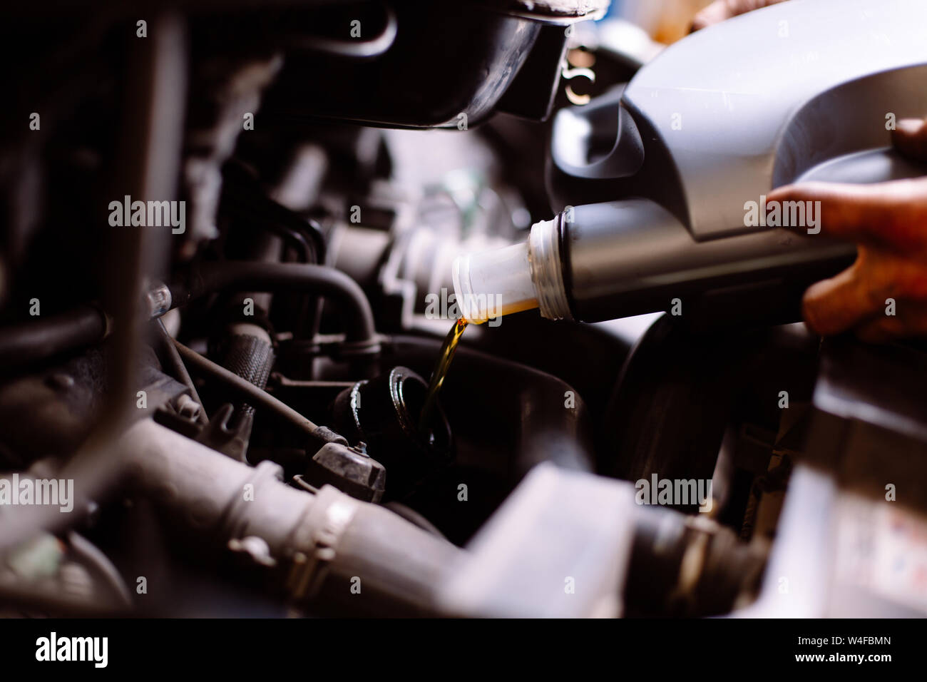 Changing of oil hi-res stock photography and images - Alamy