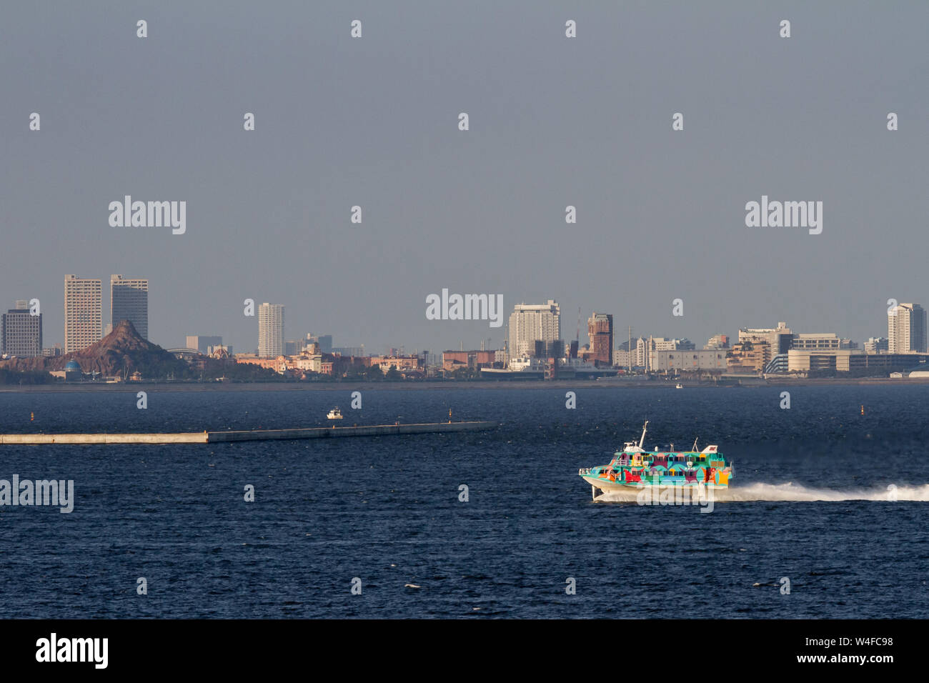 A colourful Boeing 929 jetfoil (hydrofoil) boat in Tokyo Bay with the ...