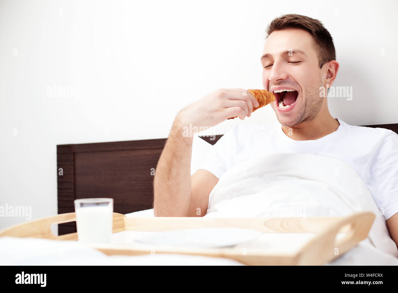 Man eating breakfast hi-res stock photography and images - Alamy