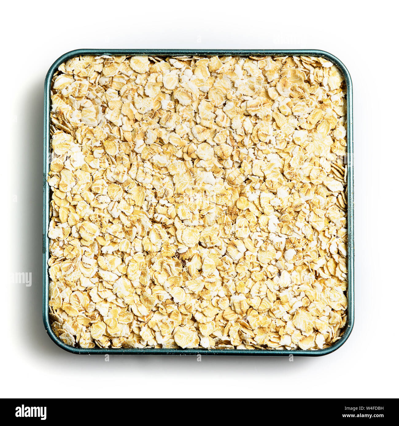 Oatmeal on white isolated background Stock Photo - Alamy