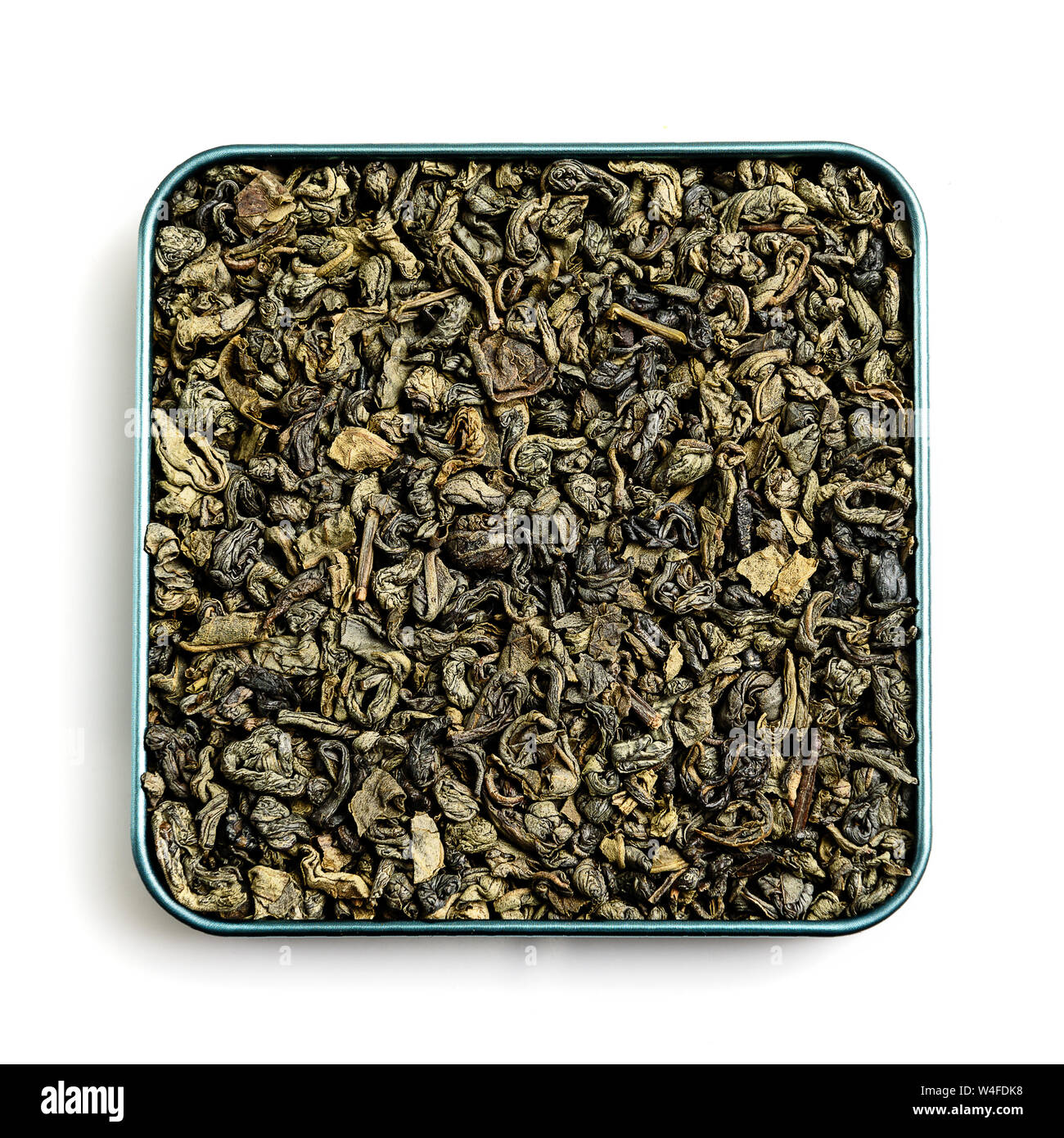Dried tea leaves on white background - top view Stock Photo - Alamy
