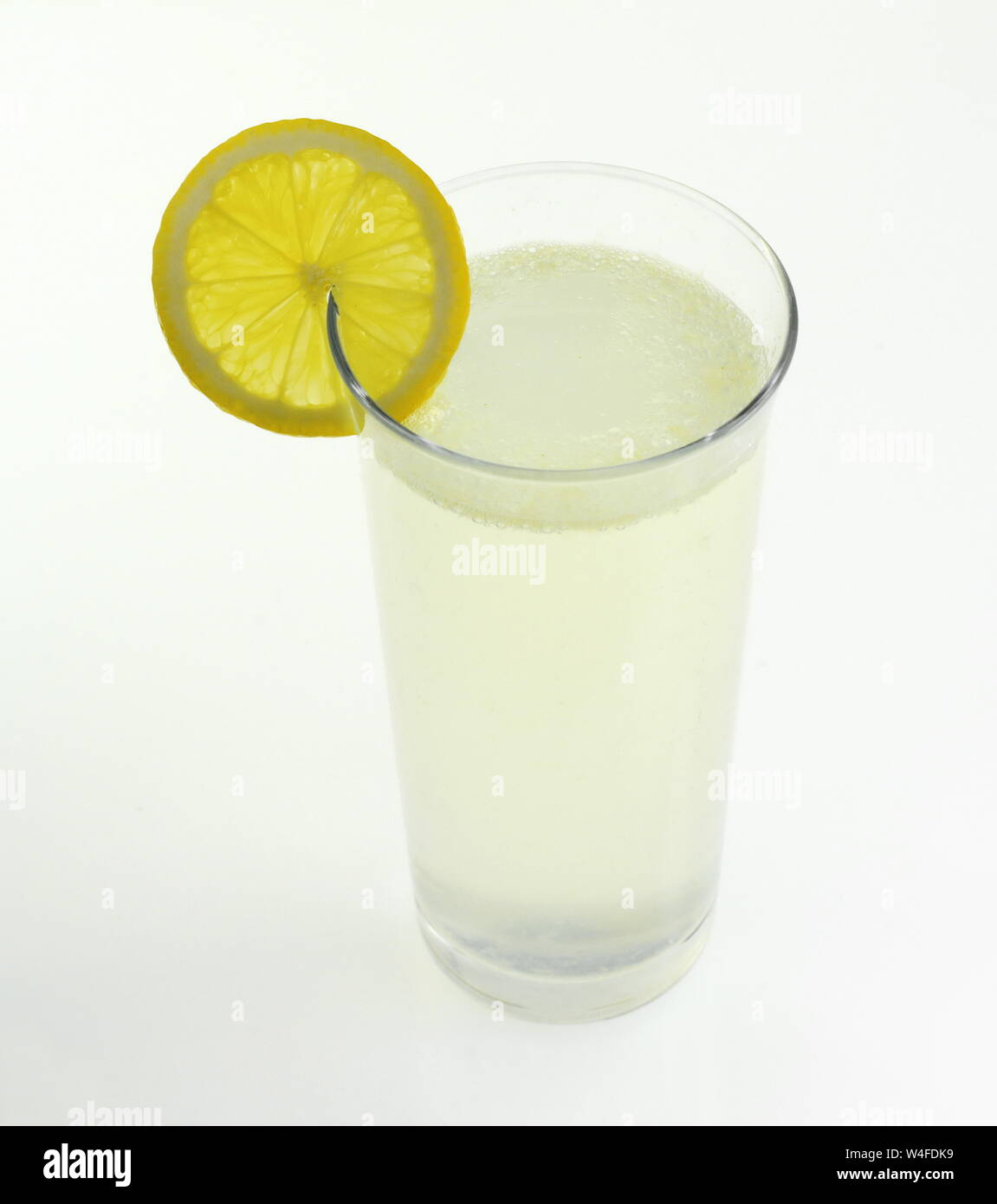 Glass of fresh lemonade on white background Stock Photo - Alamy
