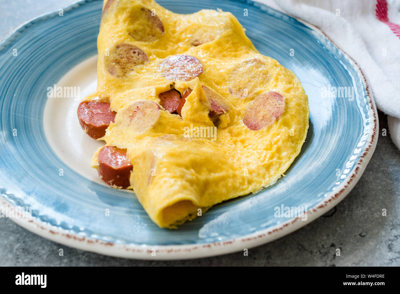 Folded Omelette with Sausage / Salami Slices for Breakfast Stock Photo ...