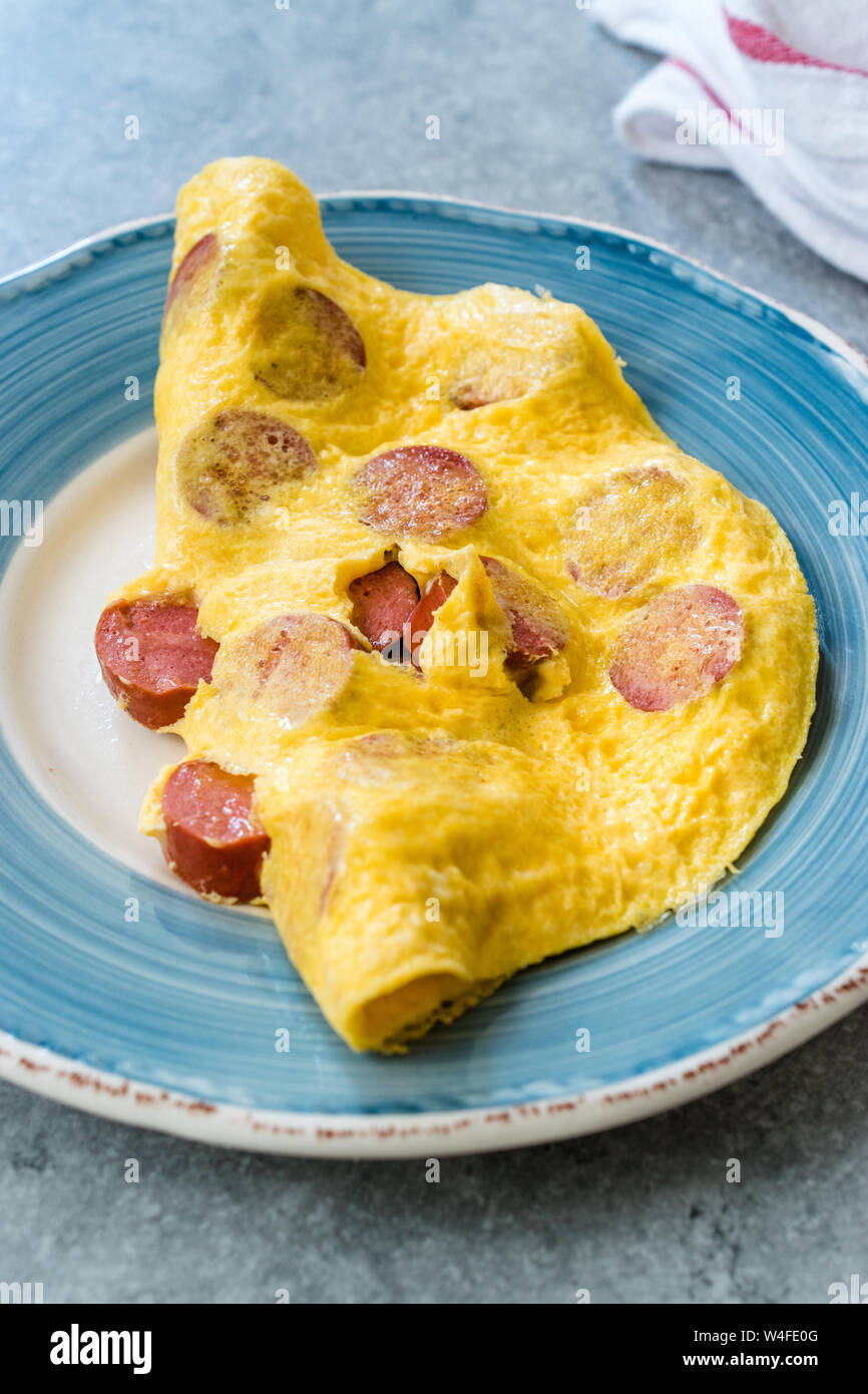 Folded Omelette with Sausage / Salami Slices for Breakfast Stock Photo ...
