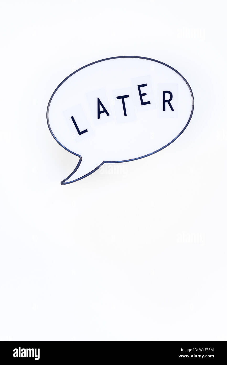 Creative top view flat lay with message Later in bubble lightbox copy ...