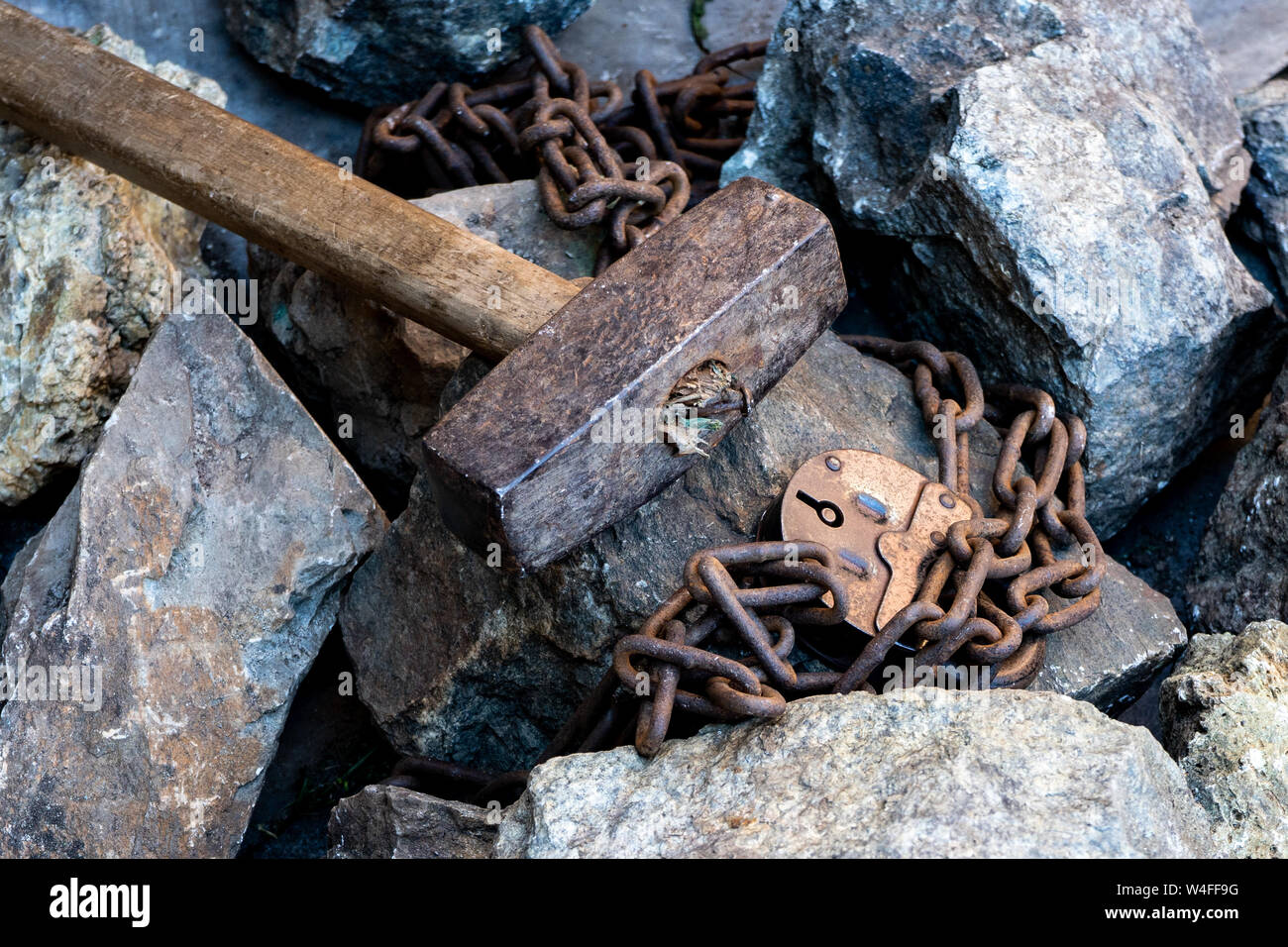 Rusty chain on the brickwork. The symbol of slave labor Stock Photo - Alamy