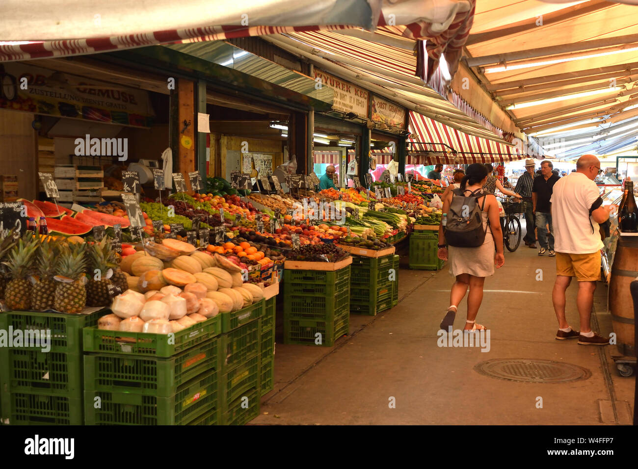 Market stalls with fruits and vegetables on the Naschmarkt in the ...