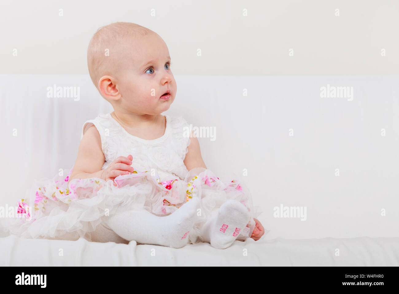 Happy childhood. Lovely little child girl in princess fairy dress ...