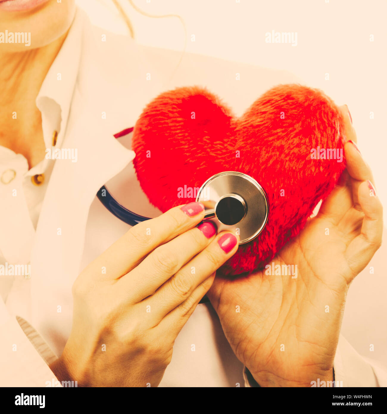 Medical examination of cardiology. Cardiologist with heart and ...