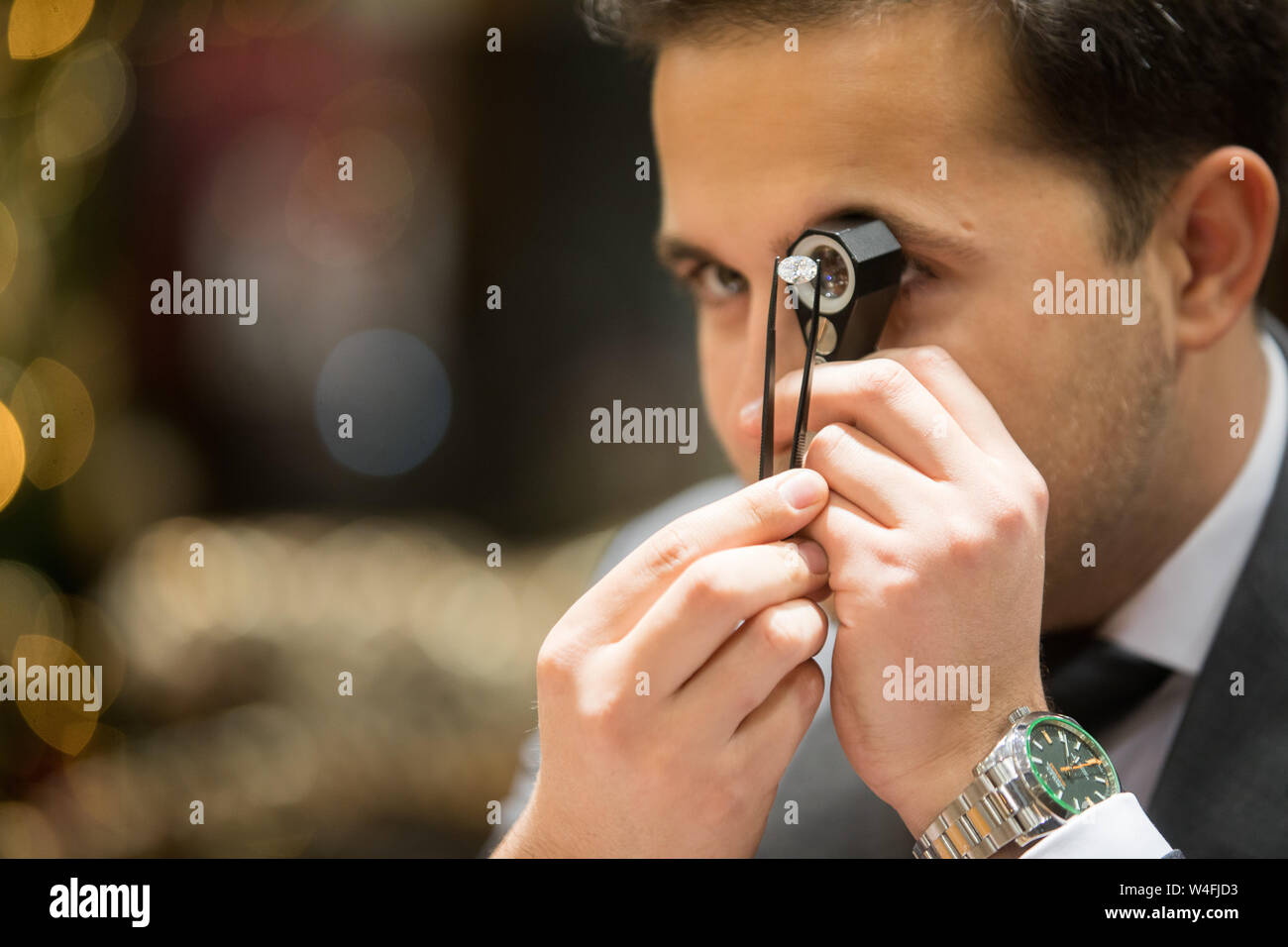 Inspecting a Diamond at Webley London Stock Photo - Alamy