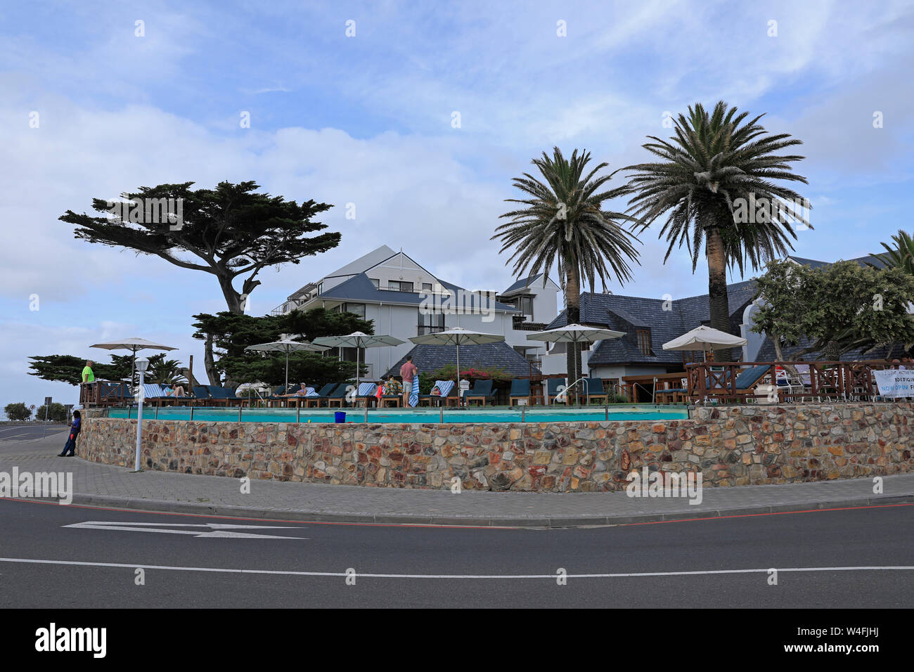 Glass walled swimming pool in the centre of Hermanus, a popular tourist ...