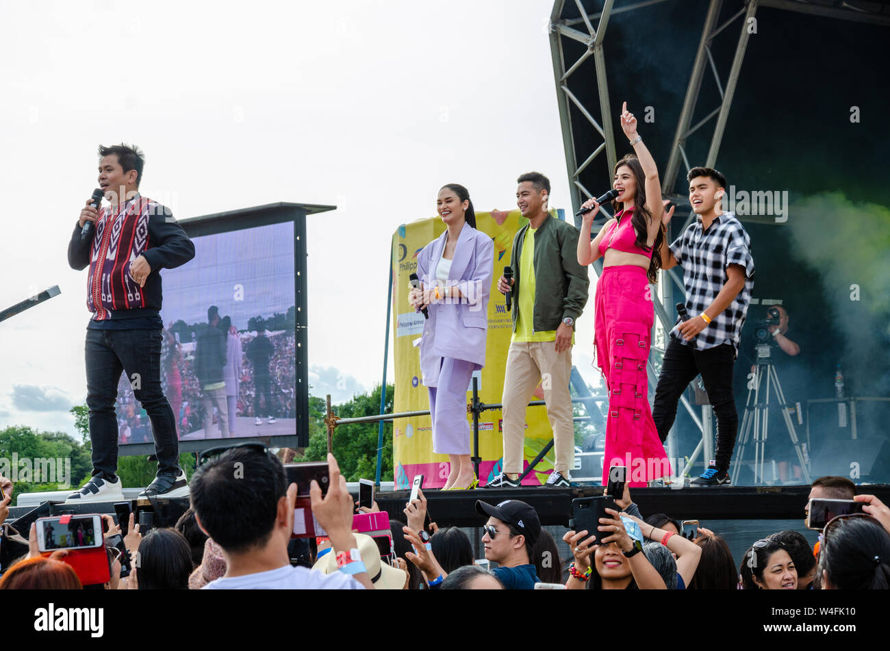Filipino artists celebrities perform on stage at a Filipino cultural ...
