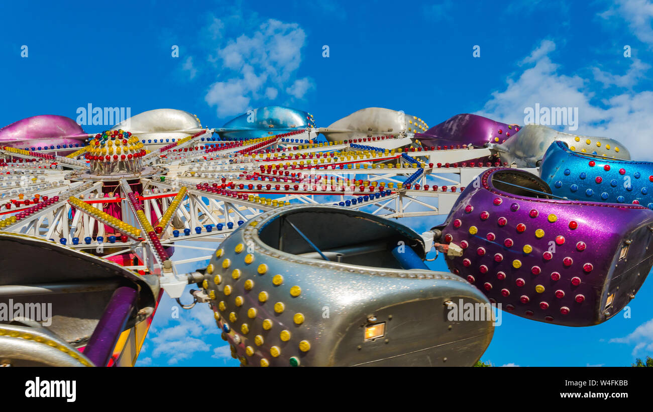 The carousel in amusement park, close-up. The Carousel is spinning ...