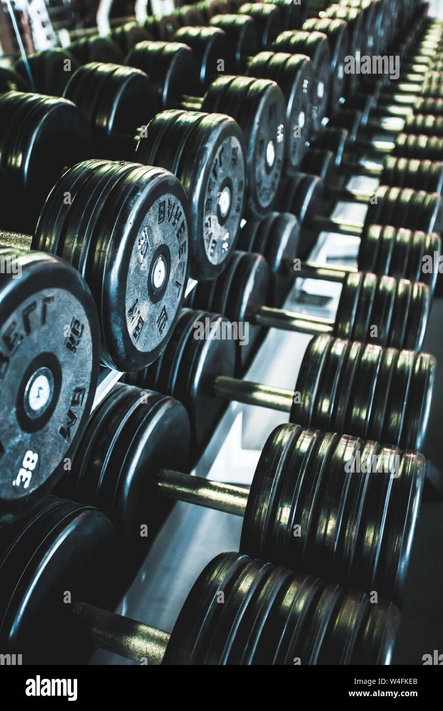 Rows of dumbbells in the gym Stock Photo - Alamy