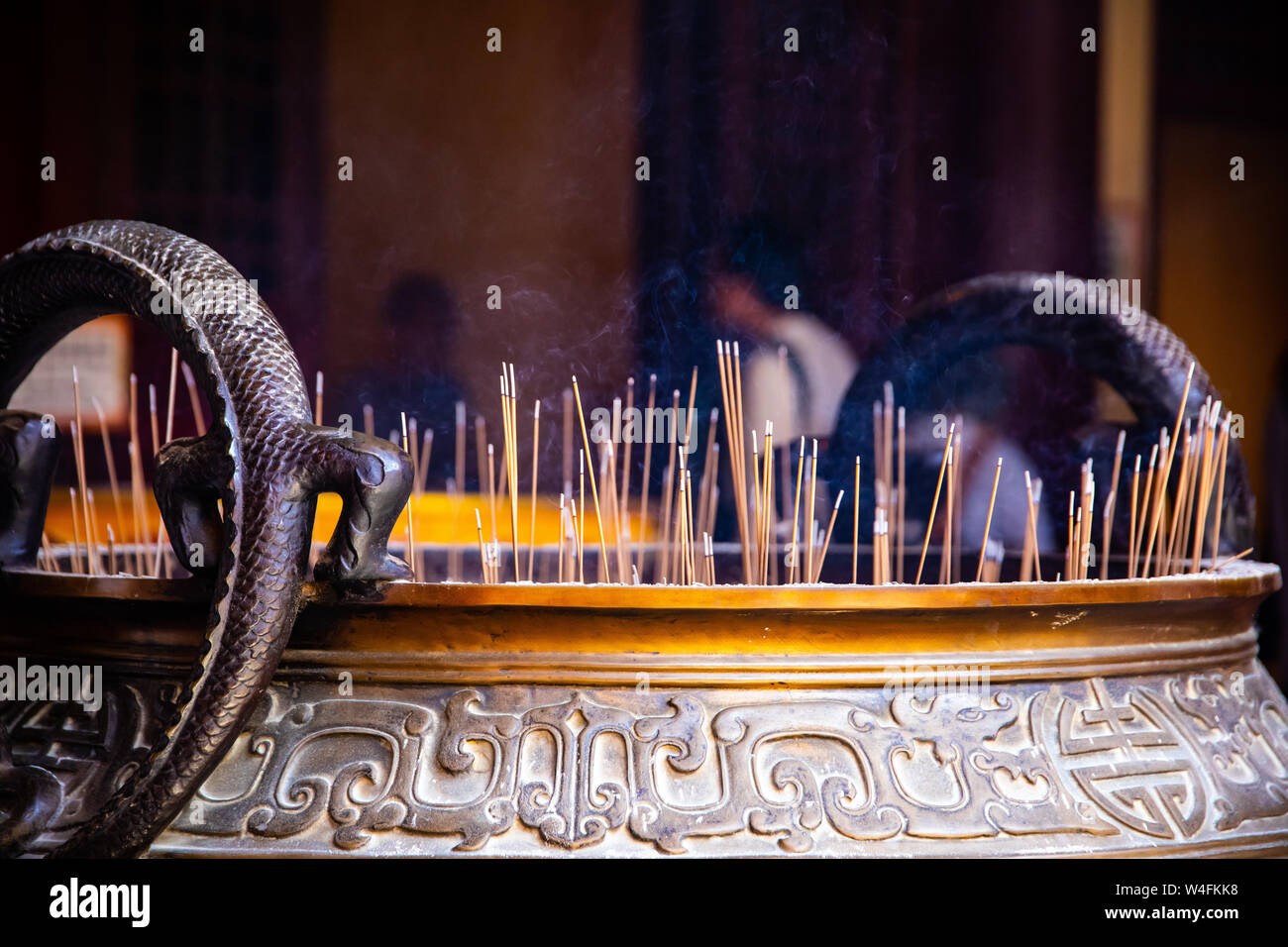 Buddha Tooth Relic Temple - prayer bowl Stock Photo - Alamy