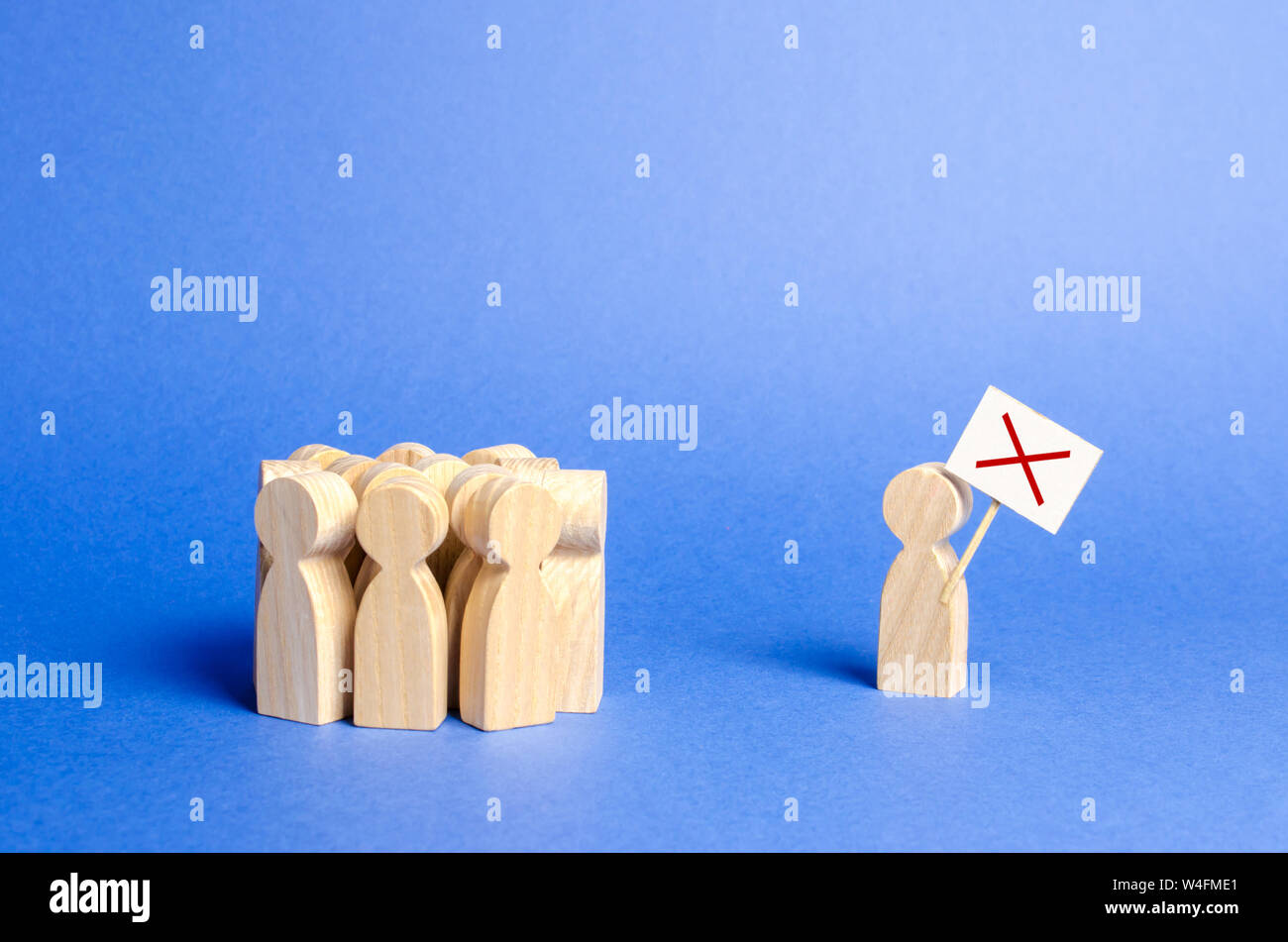 A person with a poster protests and draws public attention to the ...