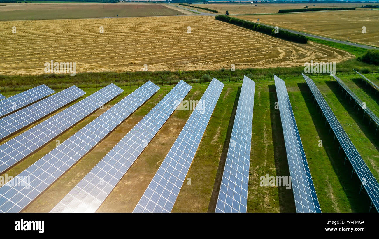 Aerial green rural and solar photovoltaic panel Stock Photo - Alamy