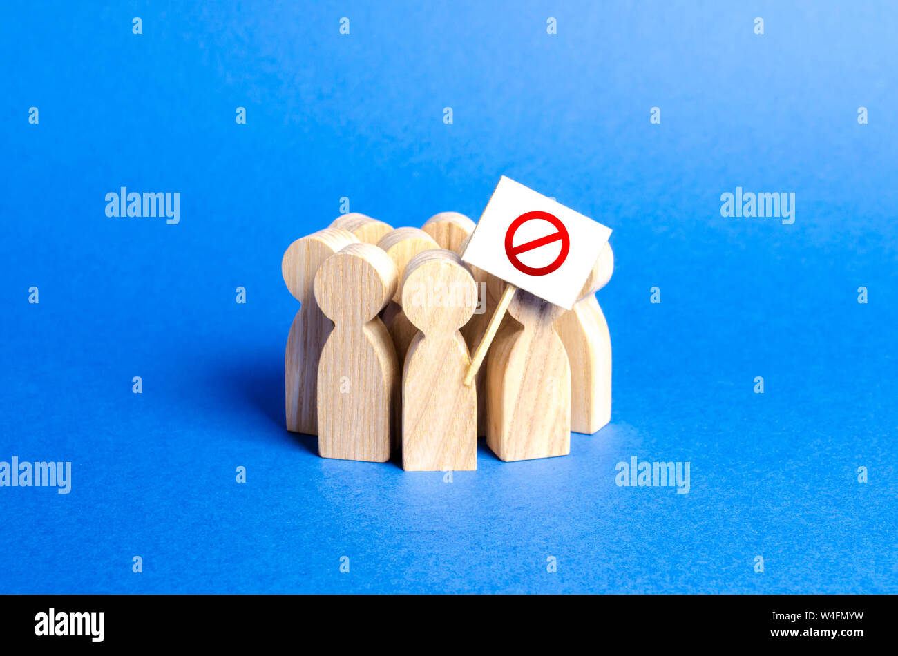 An angry mob of people with a poster. Social discontent and tension ...