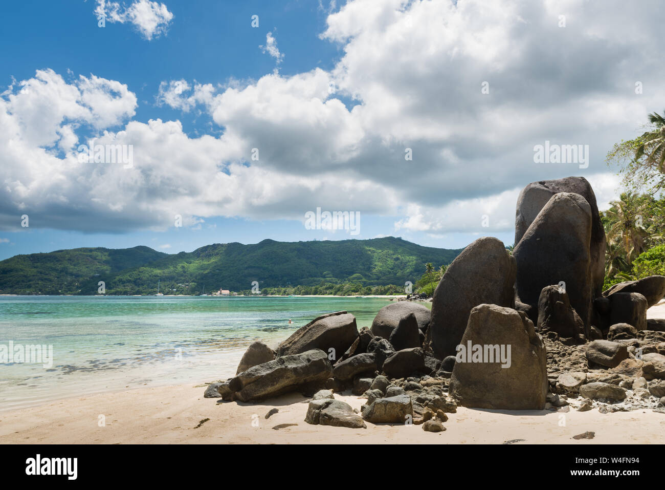 Big rocks on sandy beach. Landscape of indian ocean costline and nature ...