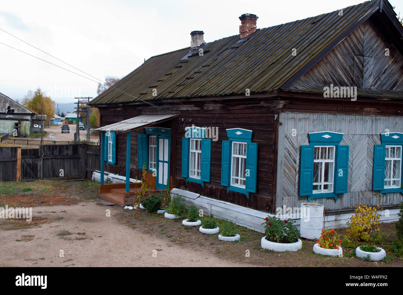 Barguzin Russia, cottage in village with bright blue shutters Stock ...