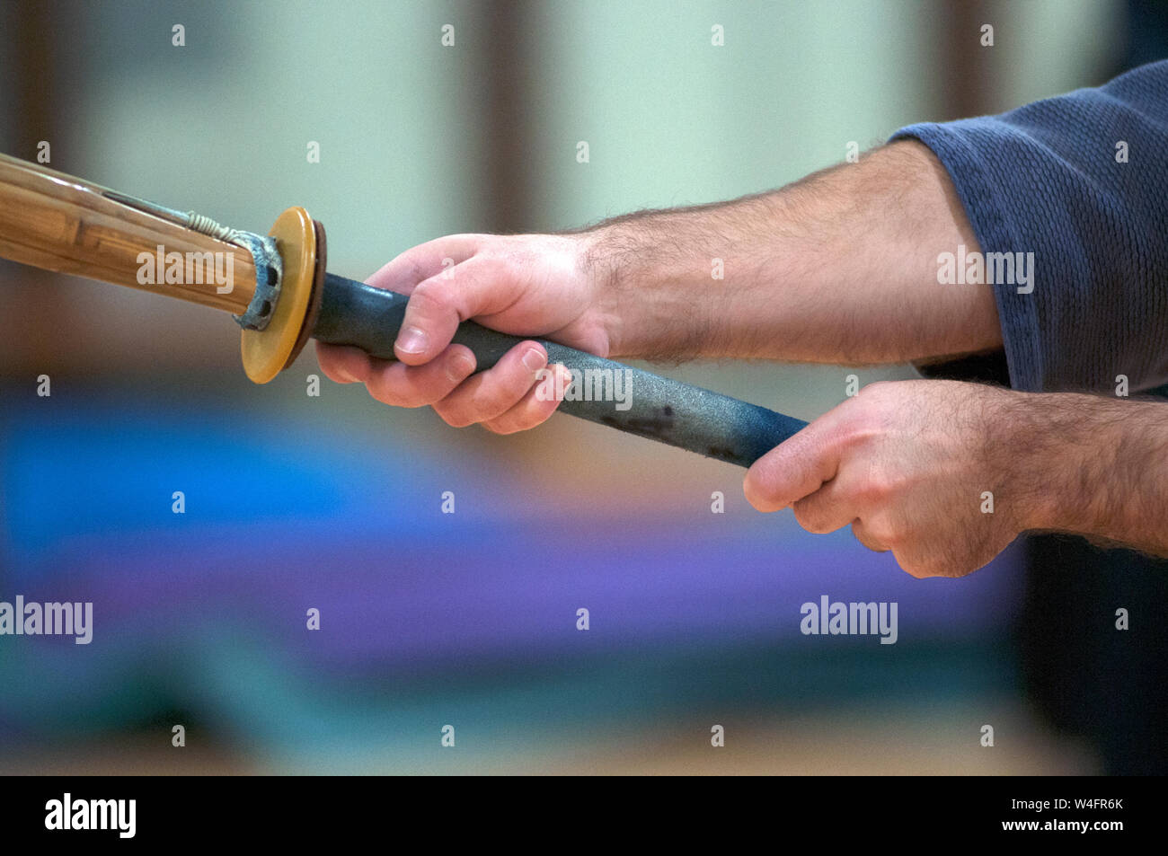 Hands holding sword hi-res stock photography and images - Alamy