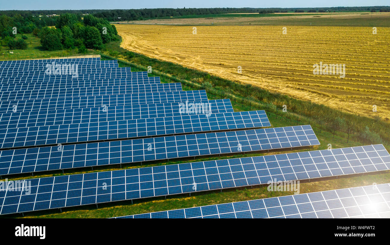 Aerial shot top view of solar panel photovoltaic farm Stock Photo - Alamy