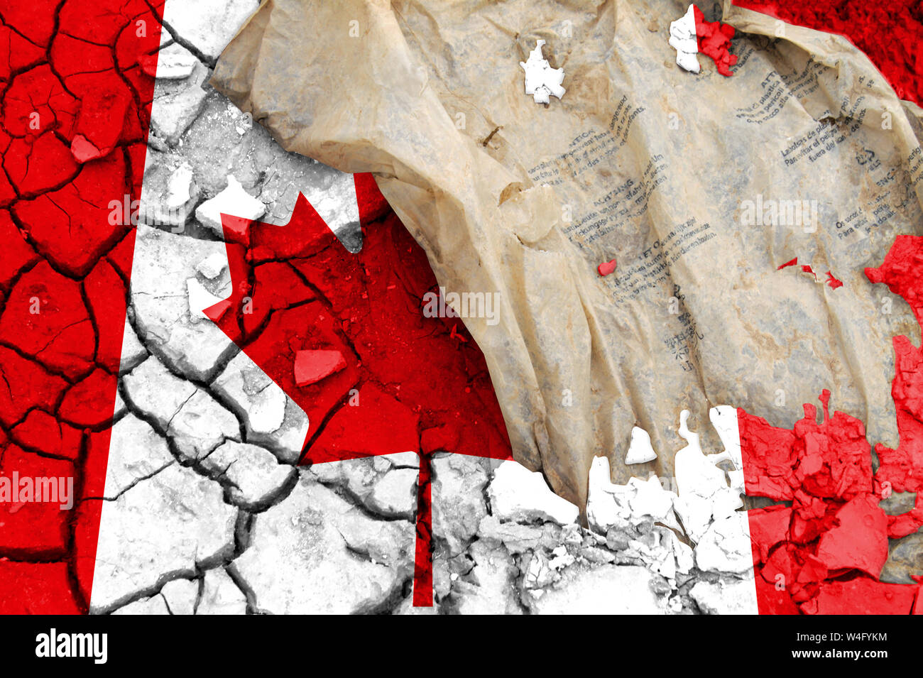 The flag of Canada, the flag is depicted on cracked earth. Ecology ...