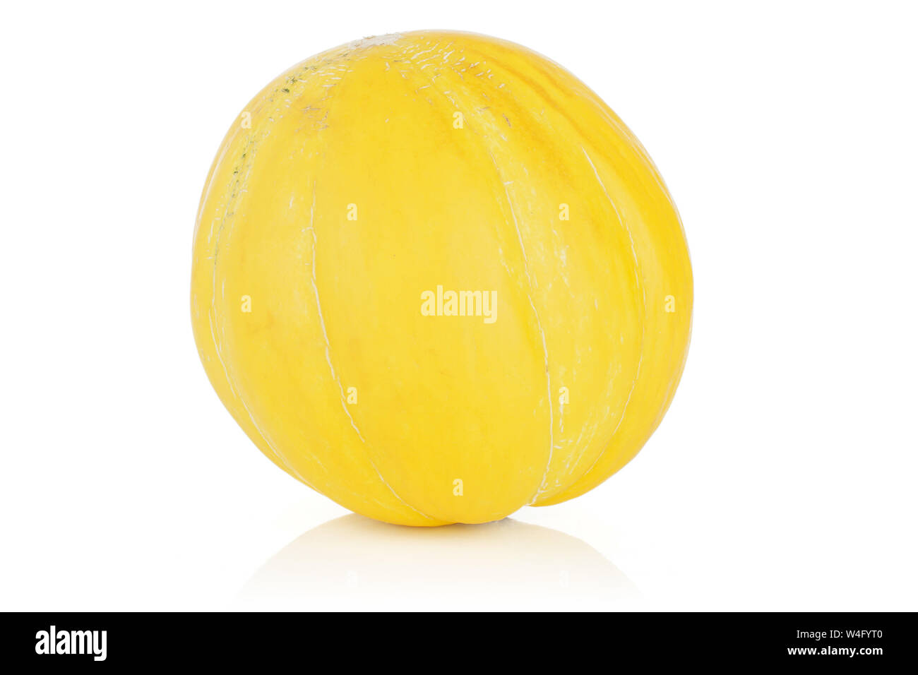 One whole fresh yellow melon canary isolated on white background Stock ...