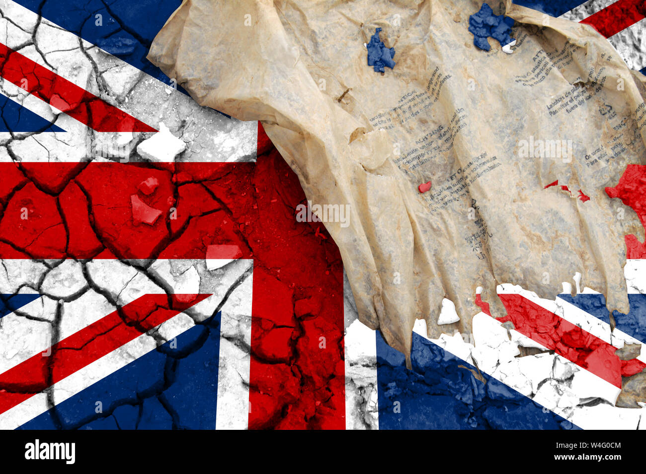 The flag of United Kingdom, the flag is depicted on cracked earth ...