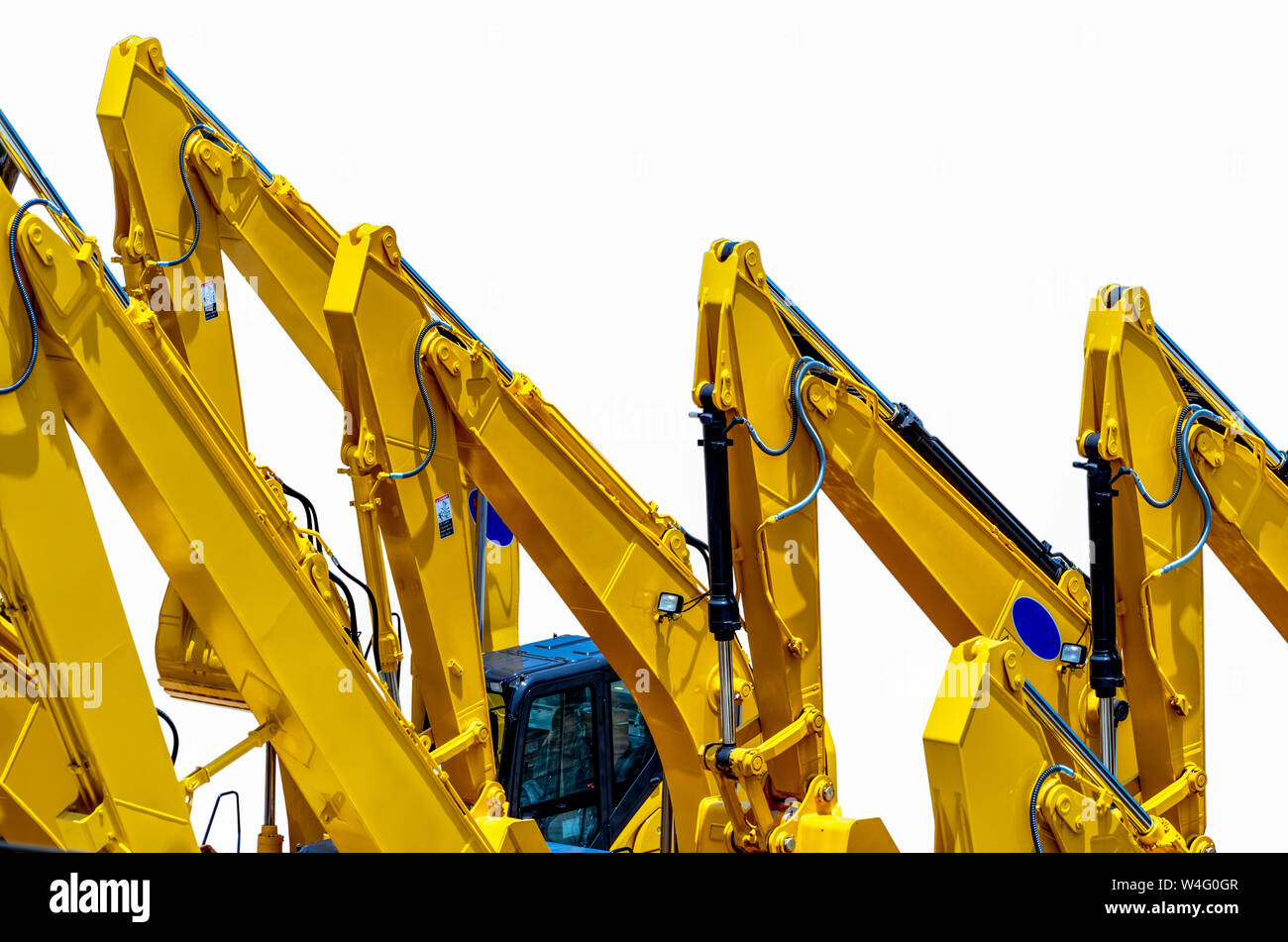 Yellow backhoe with hydraulic piston arm isolated on white. Heavy ...