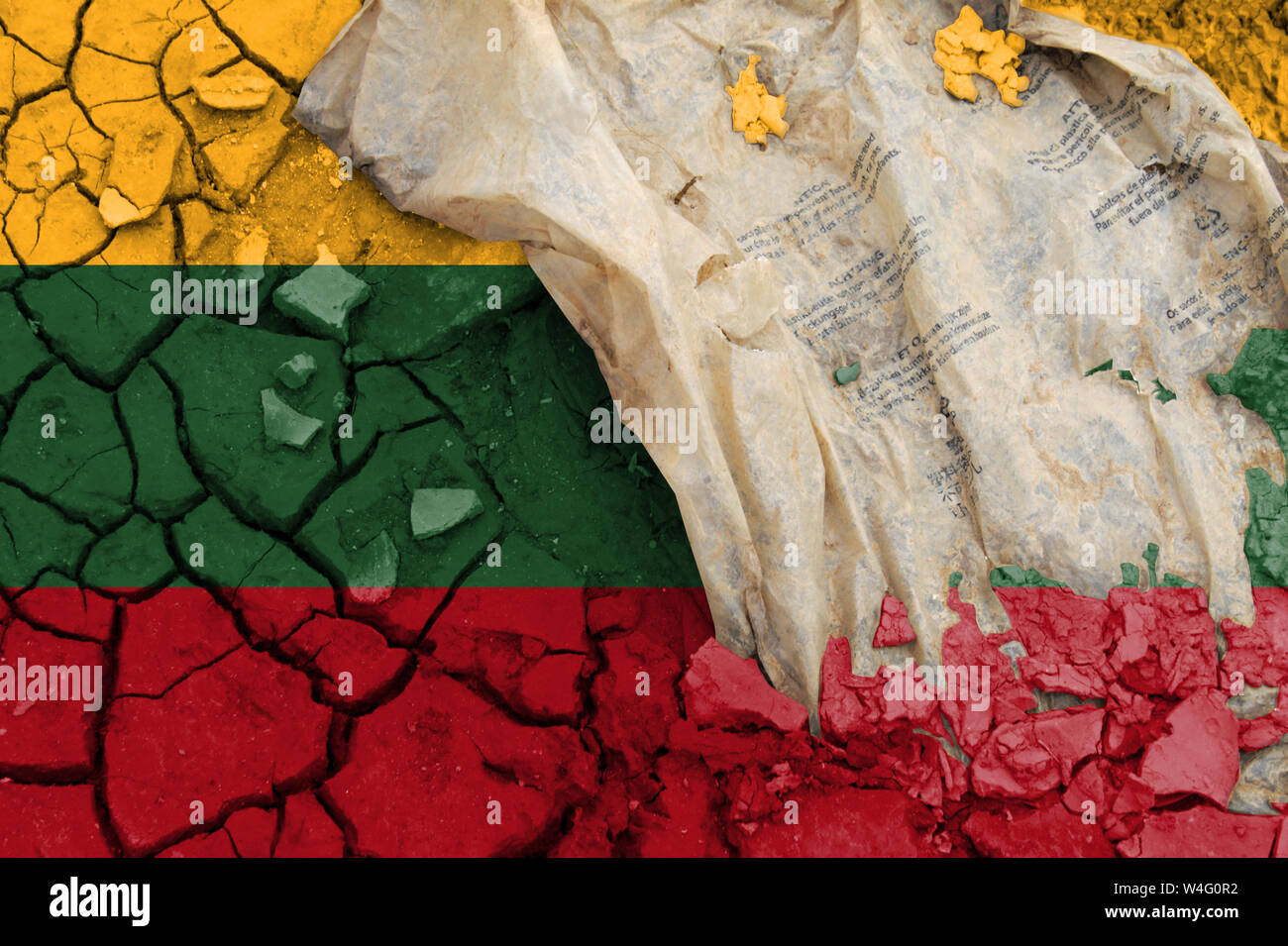 The flag of Lithuania, the flag is depicted on cracked earth. Ecology ...