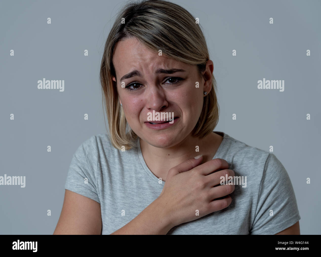 Sad female adult young crying hi-res stock photography and images - Alamy
