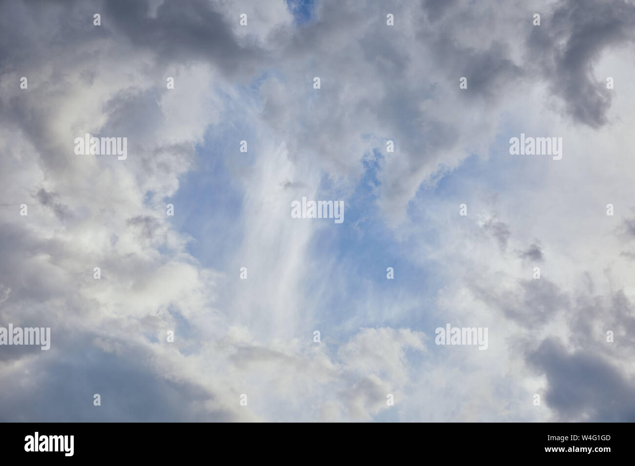 blue sky background with grey clouds Stock Photo - Alamy