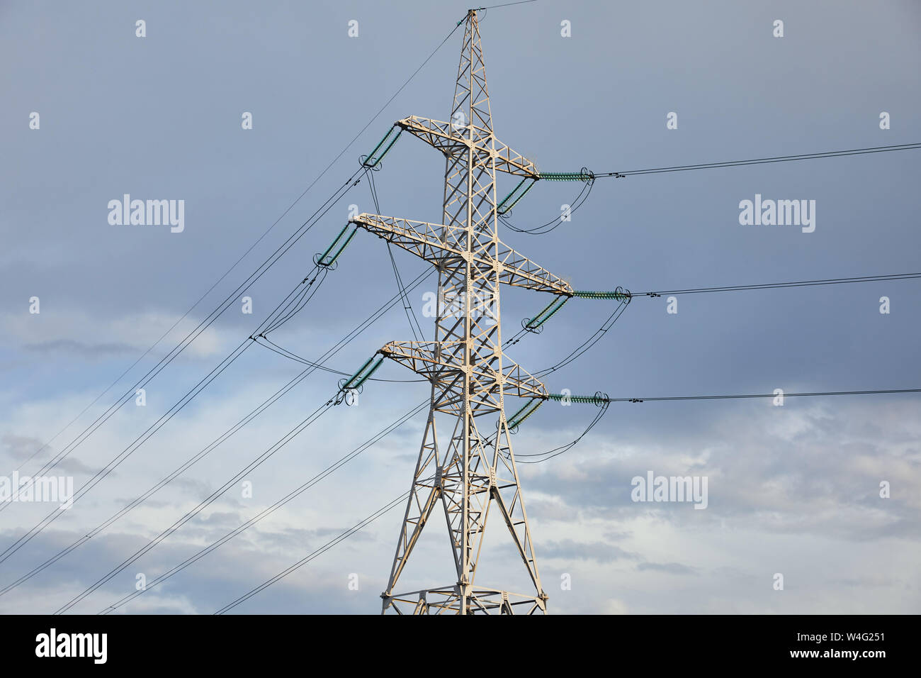 low angle view of electric pole on grey cloudy background Stock Photo ...