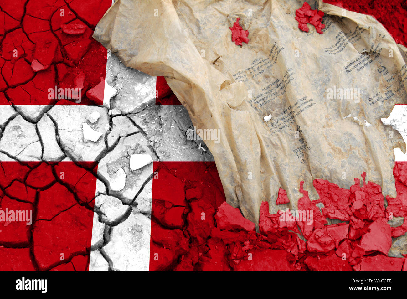 The flag of Denmark, the flag is depicted on cracked earth. Ecology ...