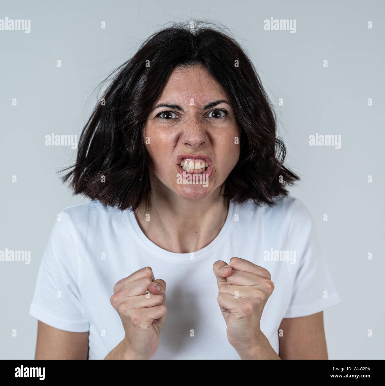 Close up of young frustrated caucasian woman with angry and stressed ...