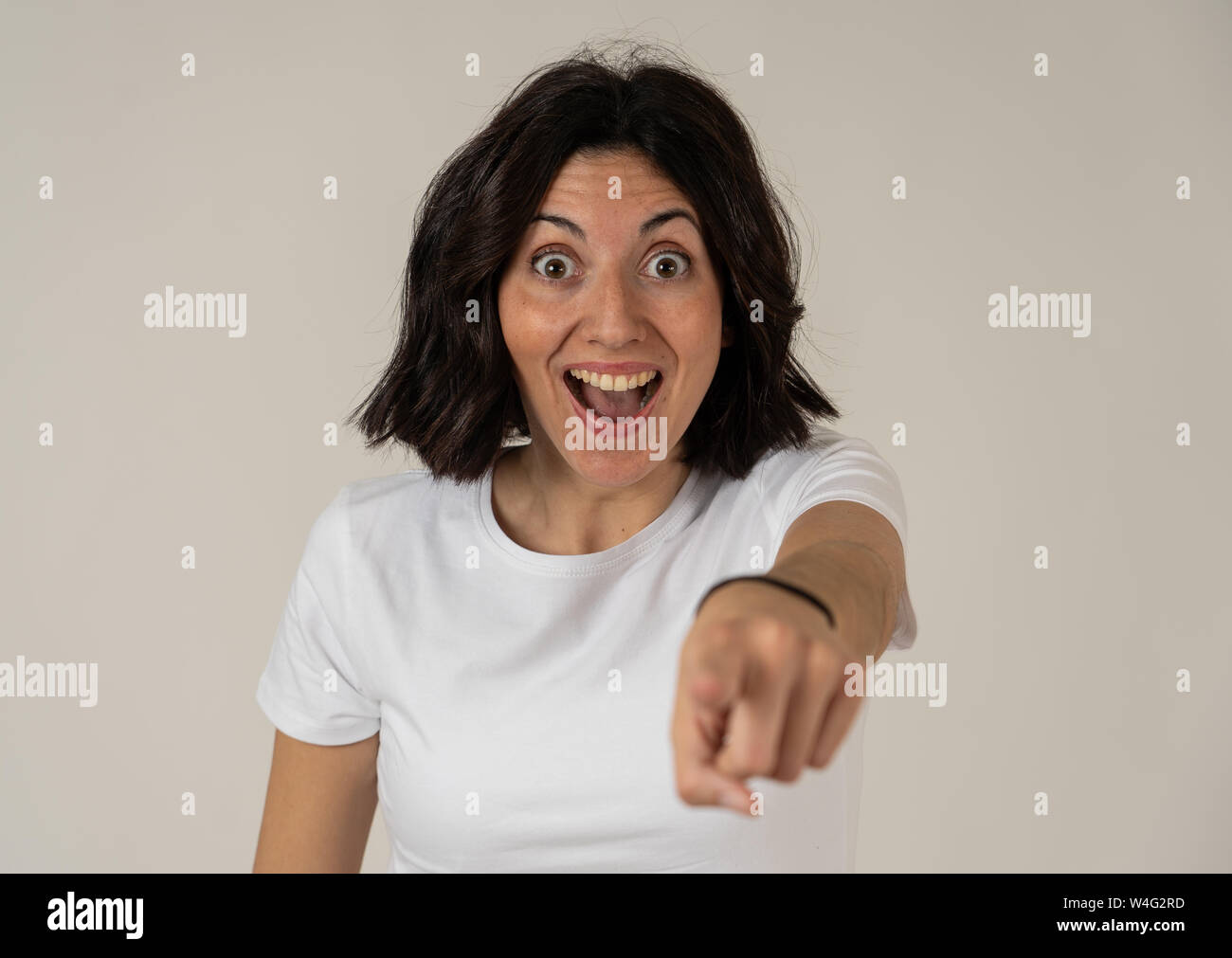 Portrait of beautiful shocked woman hearing good news or having great ...