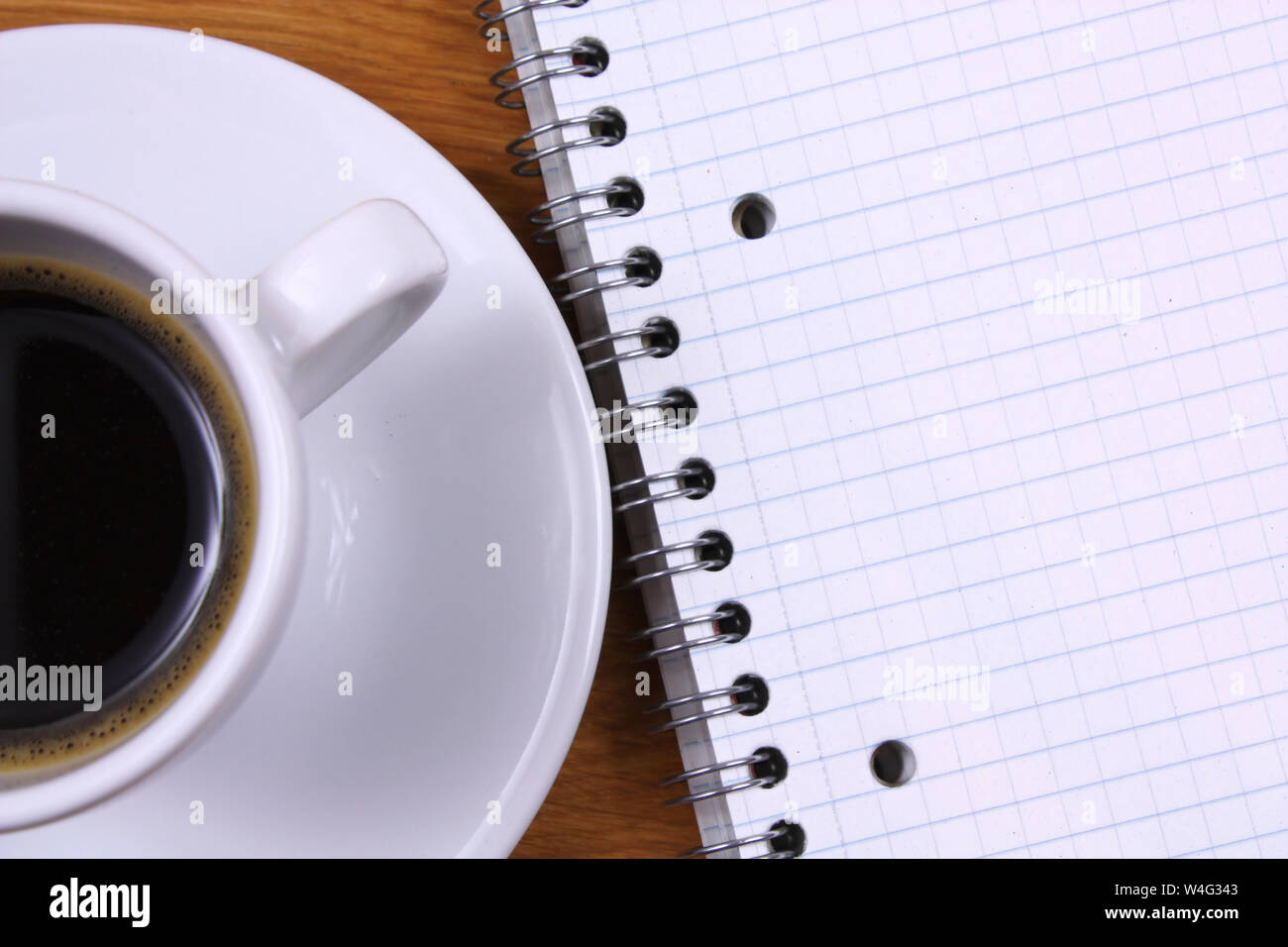 Espresso coffee and note pad. Top view Stock Photo - Alamy