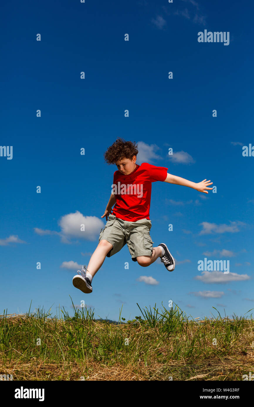 Studio teen boy running hi-res stock photography and images - Alamy